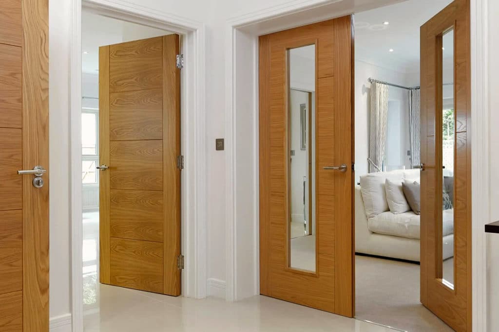 Quelle est la HAUTEUR STANDARD d'une PORTE Intérieure ? Norme 2025